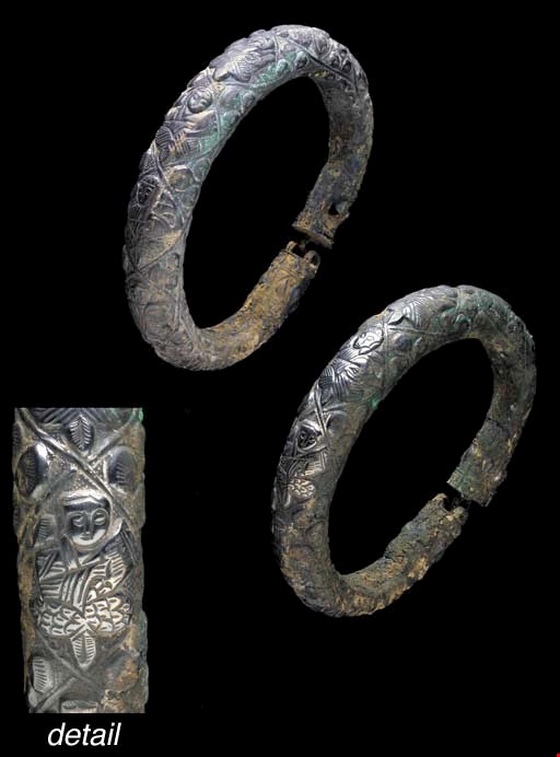 A PAIR OF FATIMID SILVER ARMLETS , EGYPT OR SYRIA, 11TH/12TH CENTURY ...