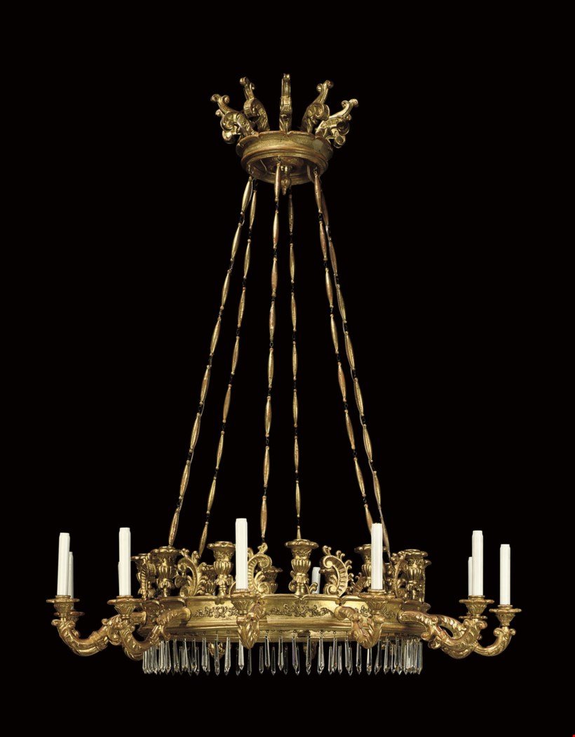 AN ITALIAN GILTWOOD AND PAPIER MACHE TWENTY-FOUR LIGHT CHANDELIER ...