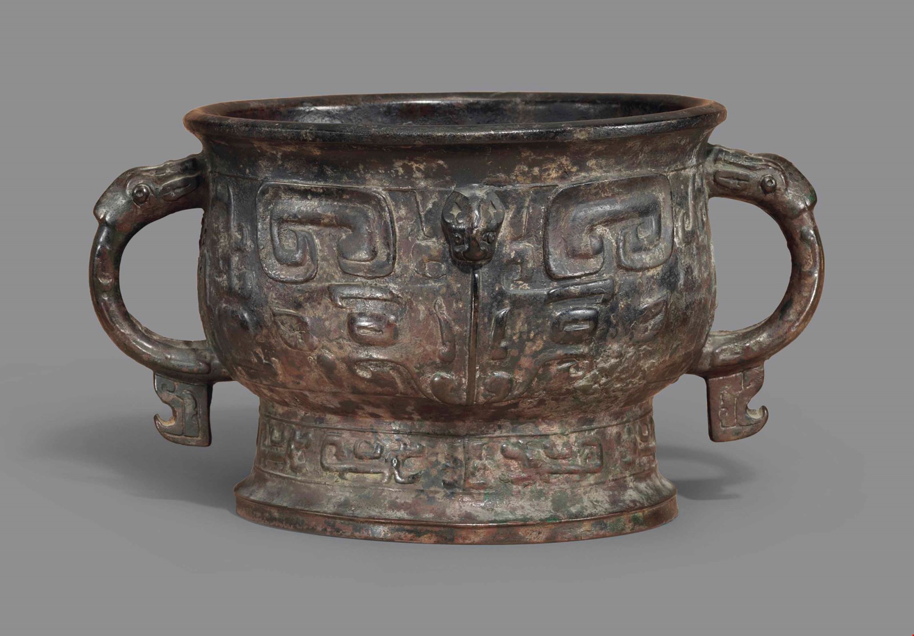A BRONZE TWIN-HANDLED VESSEL, GUI, LATE SHANG -WESTERN ZHOU DYNASTY ...