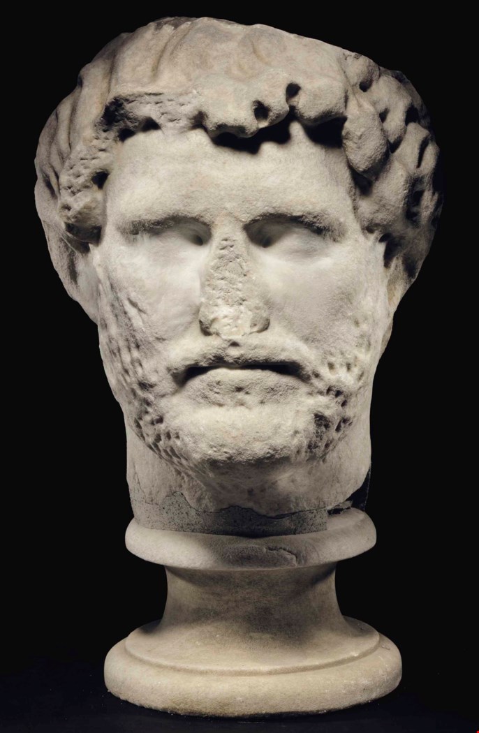 A COLOSSAL ROMAN MARBLE PORTRAIT HEAD OF THE EMPEROR HADRIAN, REIGN 117 ...