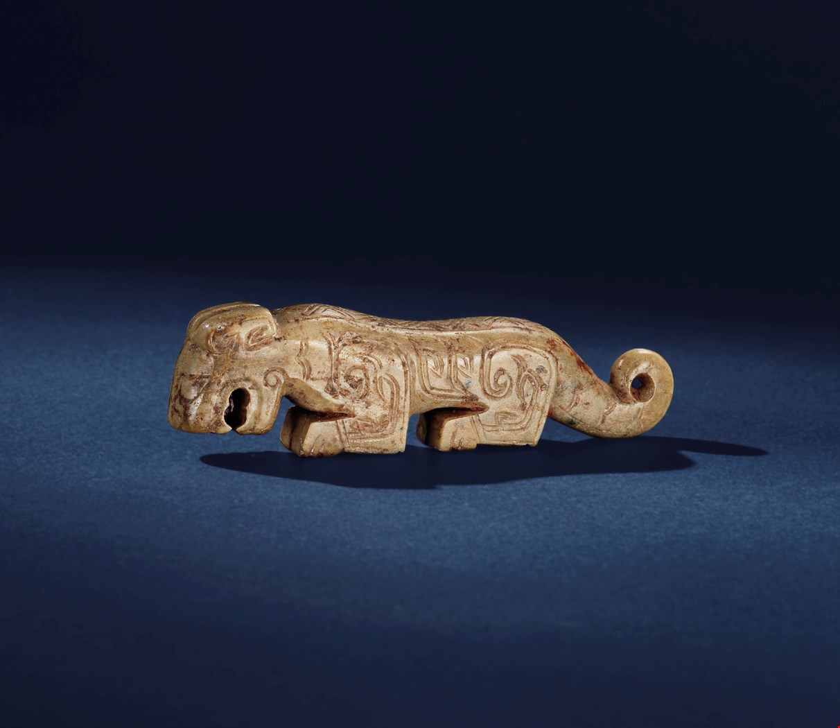 A JADE CARVING OF A TIGER, SHANG DYNASTY, C. 1600-1046 BC | Christie's