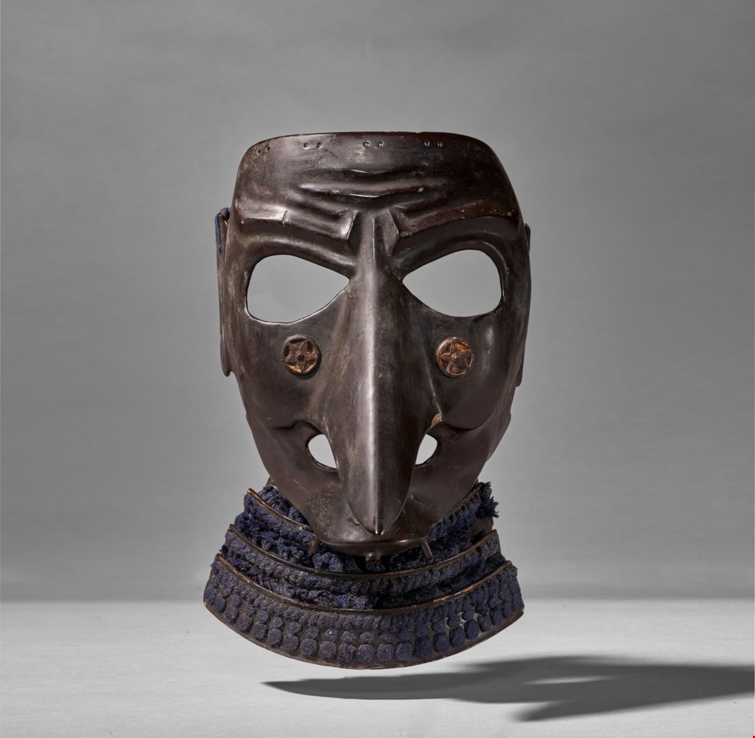 A LACQUERED IRON KARASU-TENGU MENPO (FACE MASK), EDO PERIOD (18TH-19TH ...